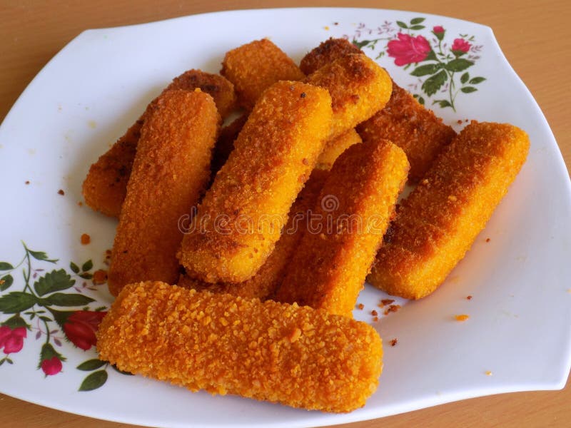 Fish fingers on plate stock photo. Image of cuisine, crunchy - 77413372