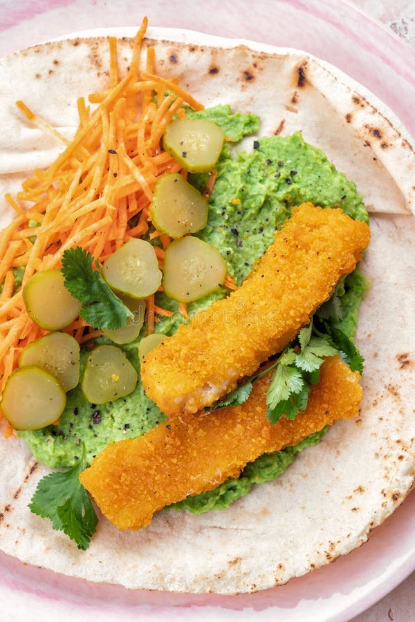 Fish Fingers Wraps with Pea Puree Stock Photo - Image of gourmet, fresh ...