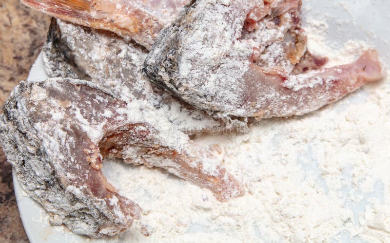 Fish in flour for frying stock photo. Image of roach - 141735218