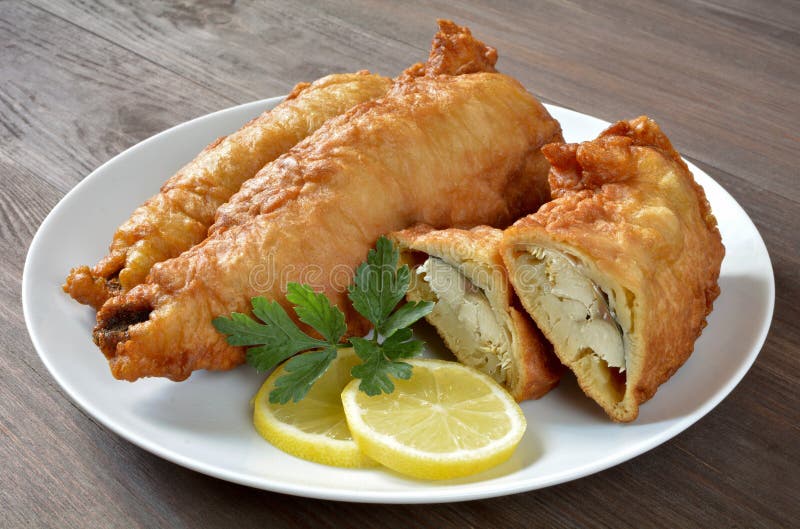 Fish fried in batter stock photo. Image of lunch, fast - 303969062