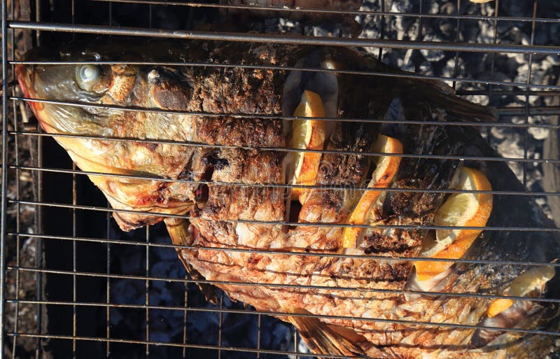 Fish Fried on the Grill Summer Outdoor Grill Smoke Stock Image - Image ...