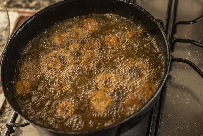 Fish frying in oil stock image. Image of meatball, lunch - 251595089