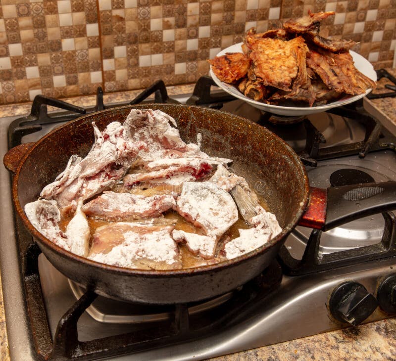Fish in a Frying Pan in Oil Stock Photo - Image of roasted, lunch ...