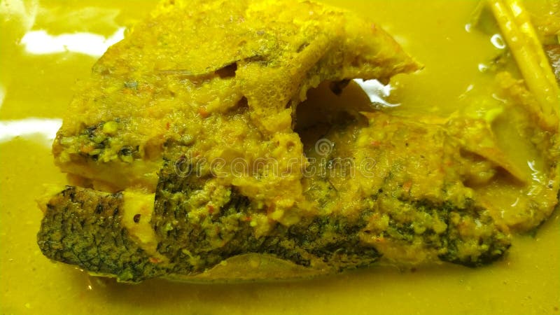 Fish Head Cooked in Coconut Milk Which is Very Delicious Stock Image ...