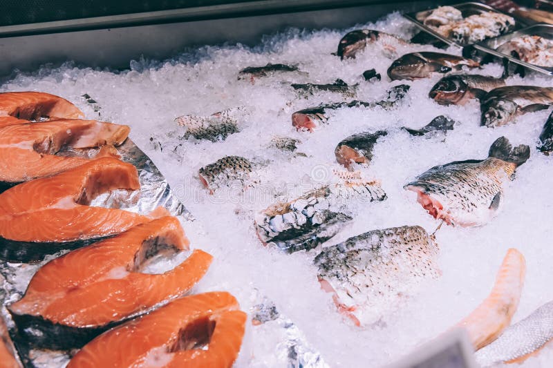 Fish with Ice in the Refrigerator in the Supermarket Stock Photo ...