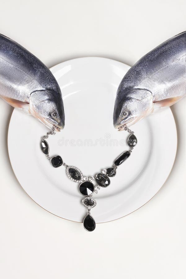 Fish and Jewelry Still Life Stock Photo - Image of composition ...