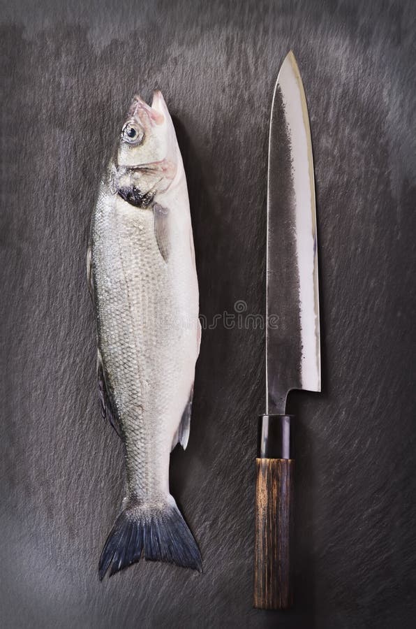 Fish with knife stock photo. Image of japanese, marine - 26963296