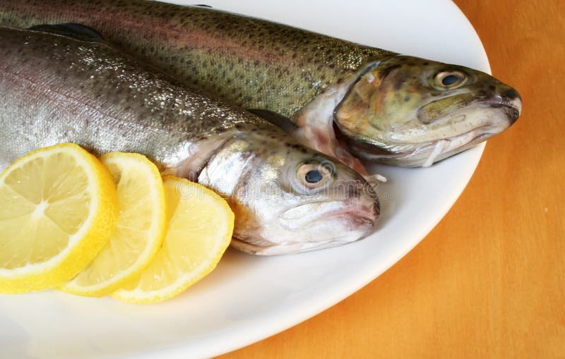 Fish with lemon stock image. Image of fresh, cook, fishy - 1819915