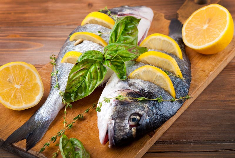 Fish with lemon stock image. Image of market, eating - 34535815