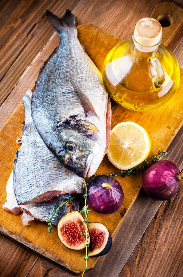 Fish with lemon stock image. Image of market, eating - 34535815