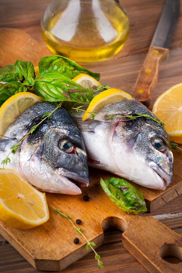 Fish with lemon stock image. Image of market, eating - 34535815