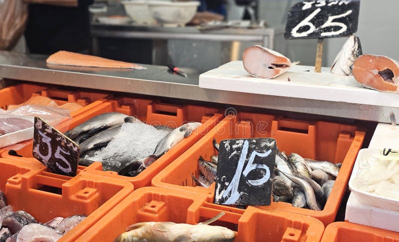 Fish Lies in Orange Boxes in a Fish Store Stock Photo - Image of health ...