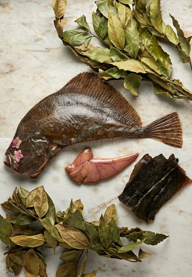 Fish, Fish Liver and Bay Leaves on the Table Stock Image - Image of ...