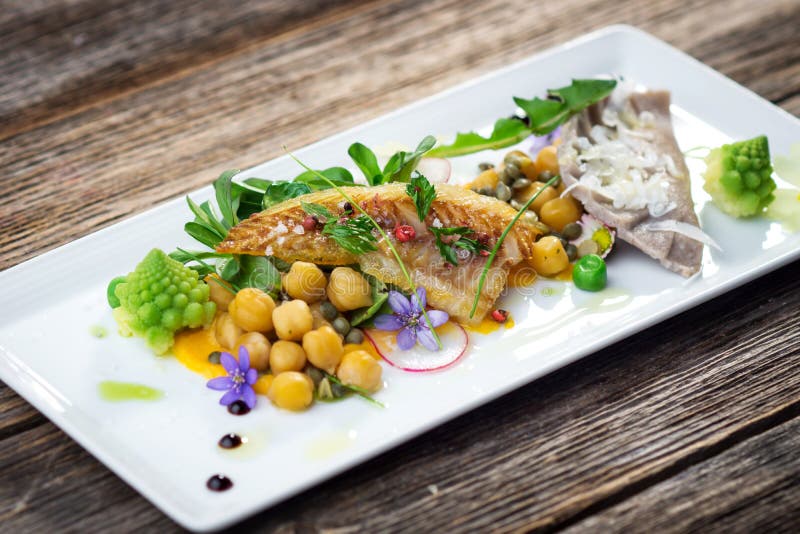 Fish meal stock photo. Image of seafish, dishes, chickpeas - 69507530