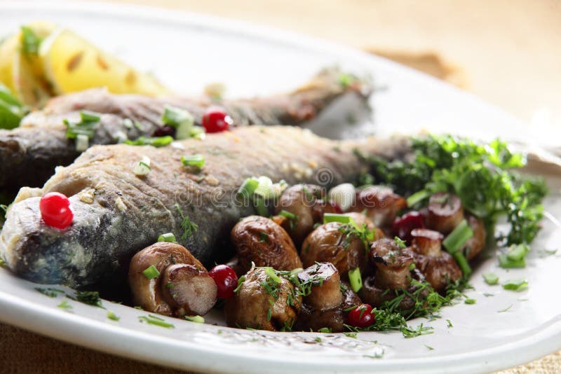 Fish with mushrooms stock photo. Image of dinner, lemon - 25320364