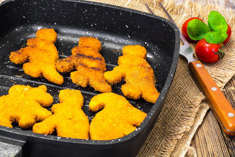 Fish Nuggets for Kids Dinosaurs Stock Image - Image of golden, fast ...