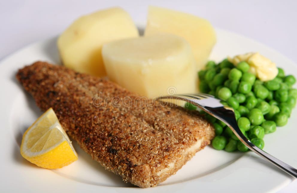 Fish in oatmeal horizontal stock image. Image of plate - 6896727