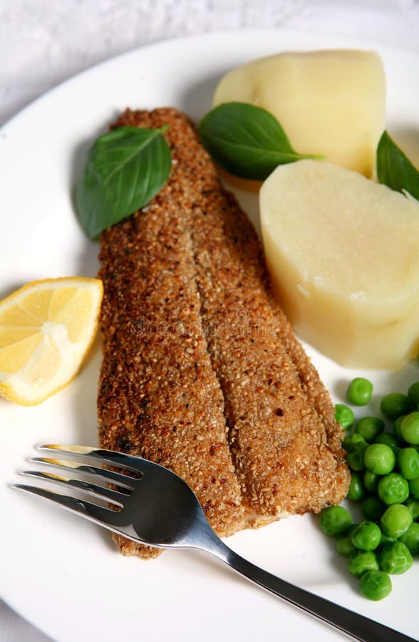 Fish in Oatmeal Meal Vertical Stock Photo - Image of potatoes, vertical ...