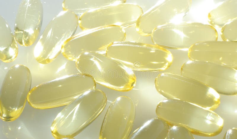 Fish oil capsules closeup stock photo. Image of dose - 31978704