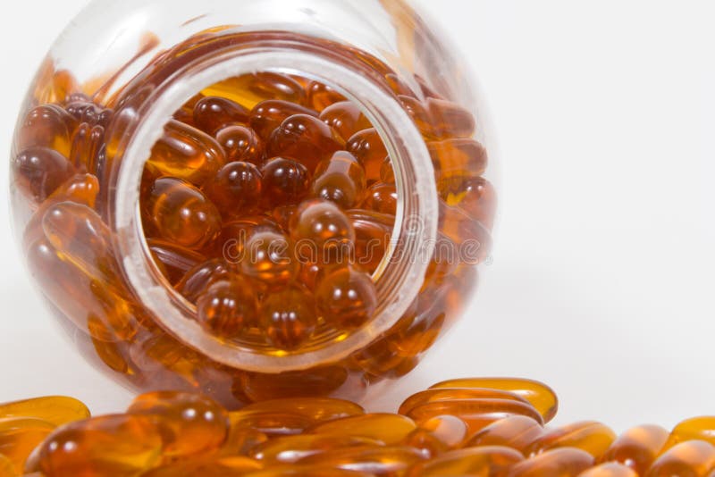 Fish Oil Capsules and Container Stock Photo - Image of pharmaceuticals ...