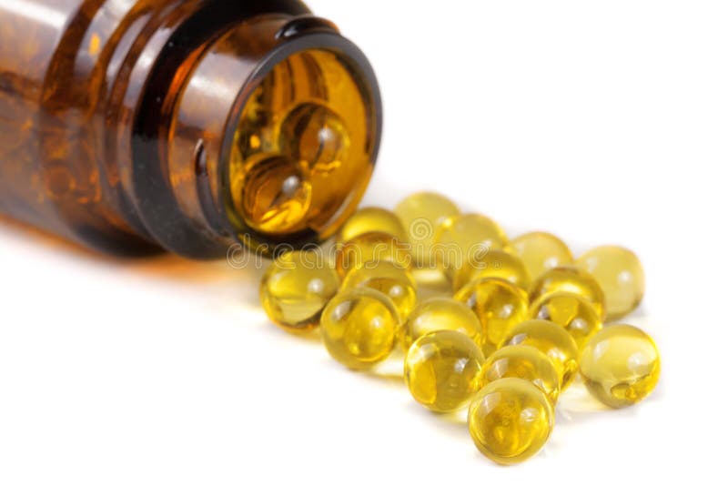 Fish Oil Capsules in a Glass Bottle Isolated on White Background Stock ...