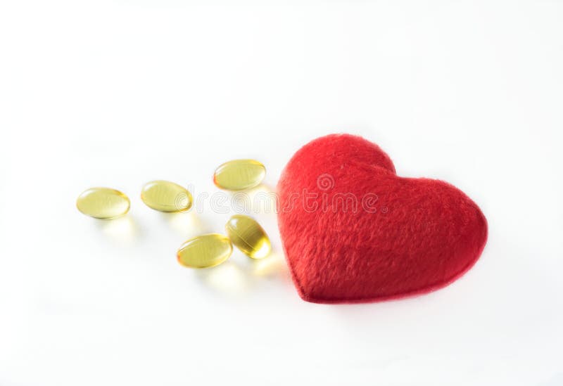 Fish Oil Capsules with Red Heart. Stock Image - Image of pharmacy ...