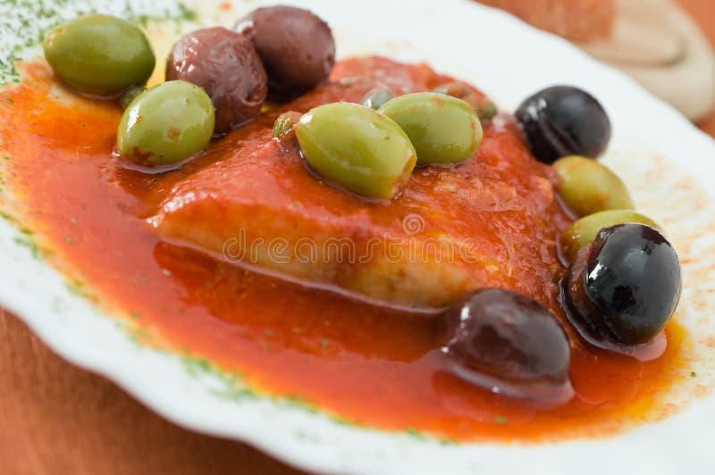 Fish with Olives in Tomato Sauce. Stock Image - Image of food ...