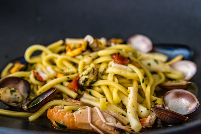 Fish pasta stock photo. Image of restaurant, mussels - 196938458