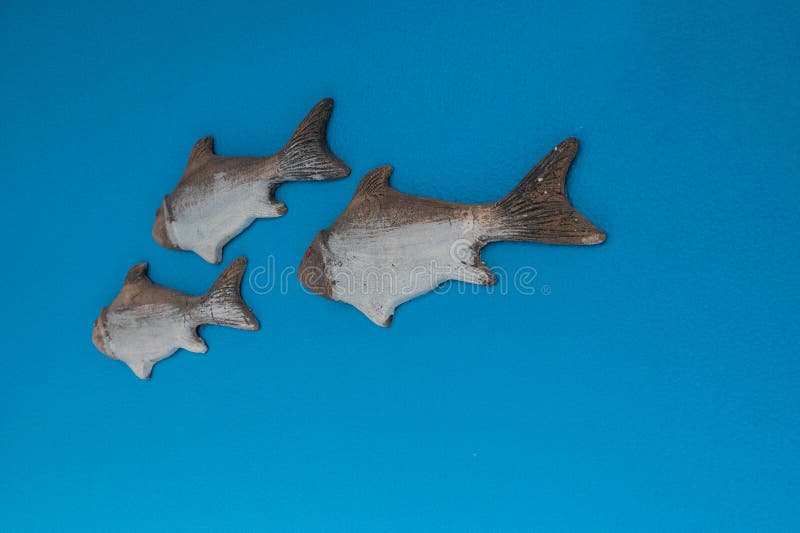 Fish Patterns Decorated on a Blue-colored Wall Surface Stock Image ...