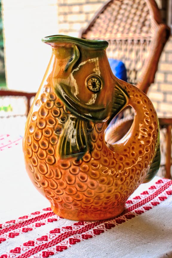 Fish Pitcher stock image. Image of brown, shaped, water - 83397847