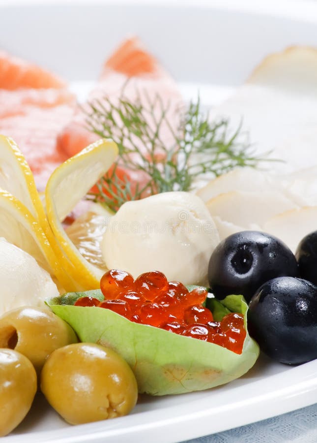 Fish on the plate stock image. Image of lemon, plate - 14334271