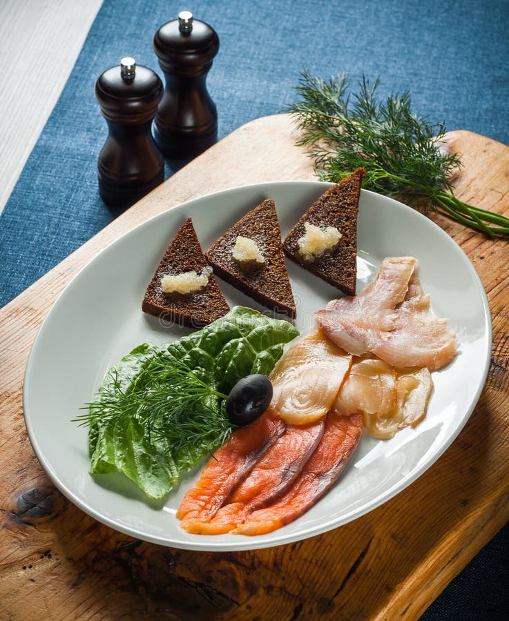 Fish Platter on a Large White Plate Stock Photo - Image of beautiful ...
