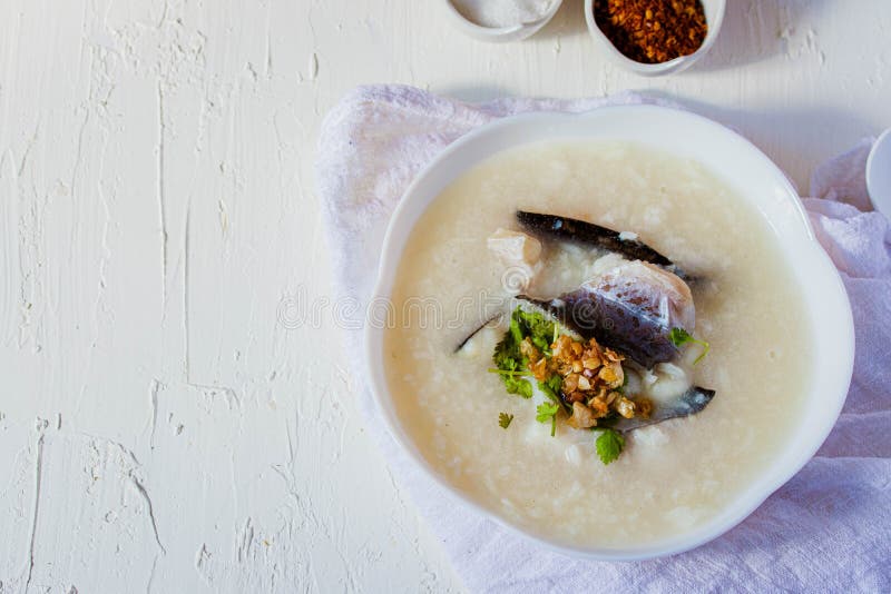 Fish Porridge in a White Bowl Stock Photo - Image of kitchen, diet ...