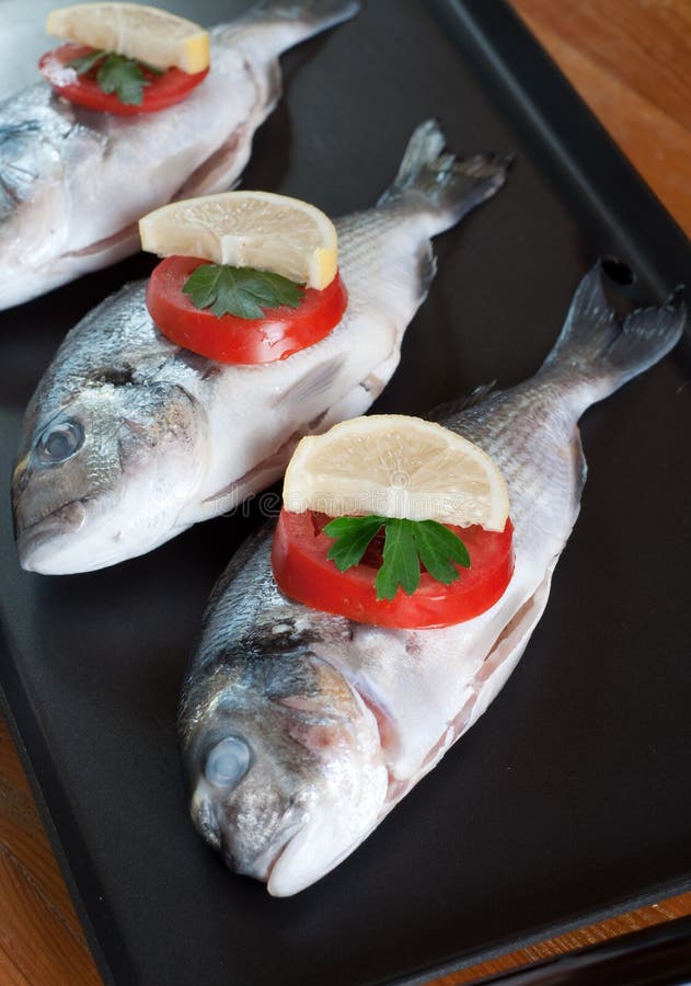 Fish dish 2 stock image. Image of healthy, tomatoes, dish - 1568317