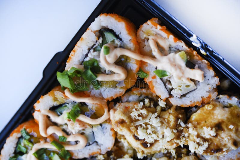 Fish Rolls with Sauce. Japanese Sushi Rolls Stock Image - Image of ...
