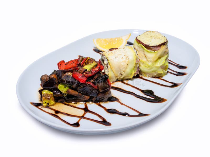 Fish Rolls with Stewed Vegetable Stew with Sauce and a Slice of Lemon ...