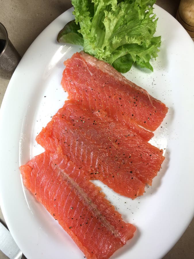 Fish salmon on a plate stock photo. Image of salmon - 131289846
