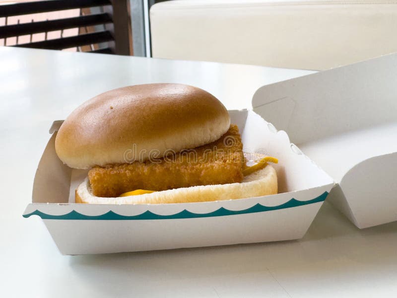 Fish Sandwich in Open Box on White Surface Editorial Photography ...