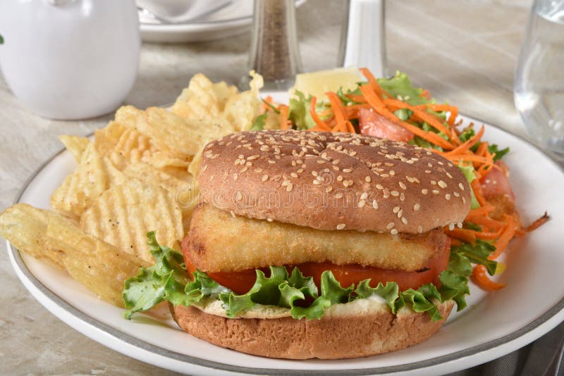 Fish Sandwich with Crinkle Cut Potato Chips Stock Photo - Image of ...