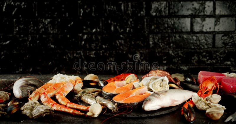 Fish and Seafood Rotate on a Stone Board. Stock Footage - Video of ...