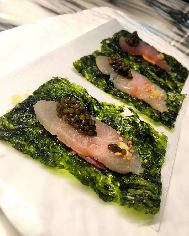 Fish on seaweed stock image. Image of snack, japan, fresh - 105711215