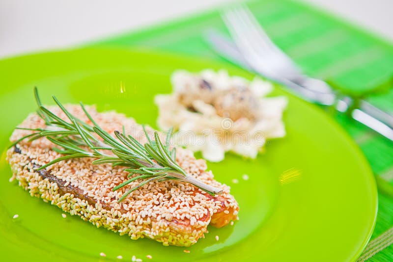 Fish with Sesame on a Green Plate Stock Image - Image of easter, crop ...