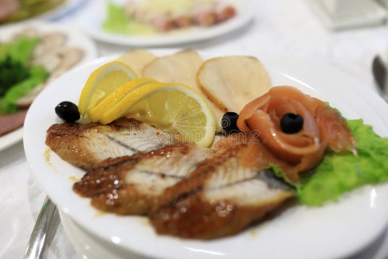 Fish sliced on plate stock image. Image of plate, kitchen - 142752987