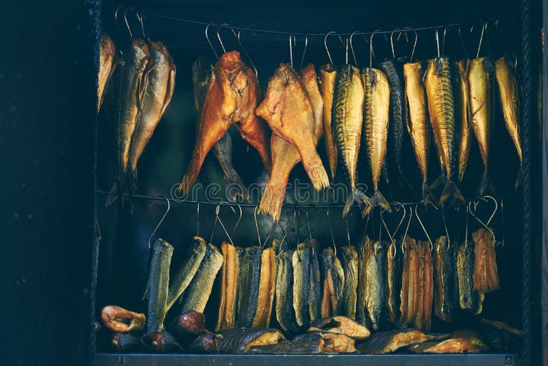 Fish smoking in a smoker stock photo. Image of lithuania - 111257030