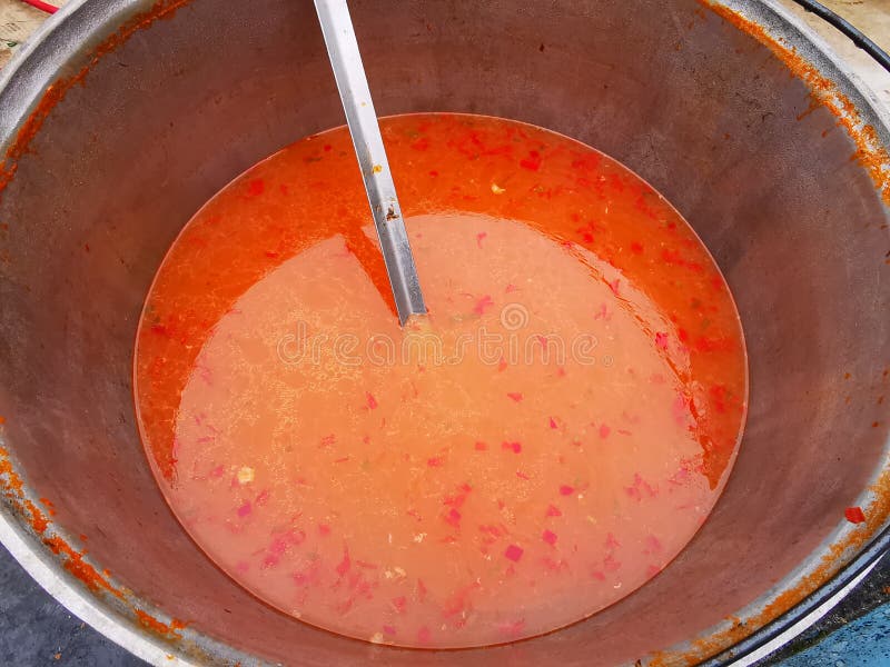 Fish soup in the cauldron stock photo. Image of ladle - 260719166