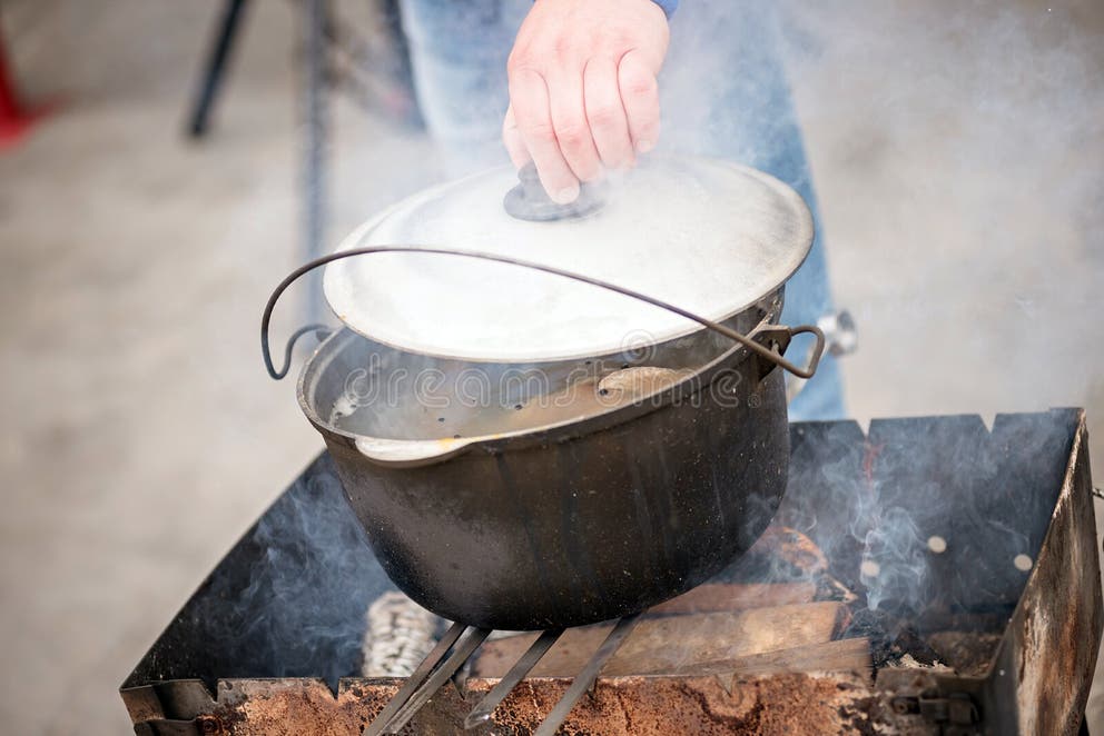 Fish soup on the fire stock photo. Image of flame, dinner - 76732094