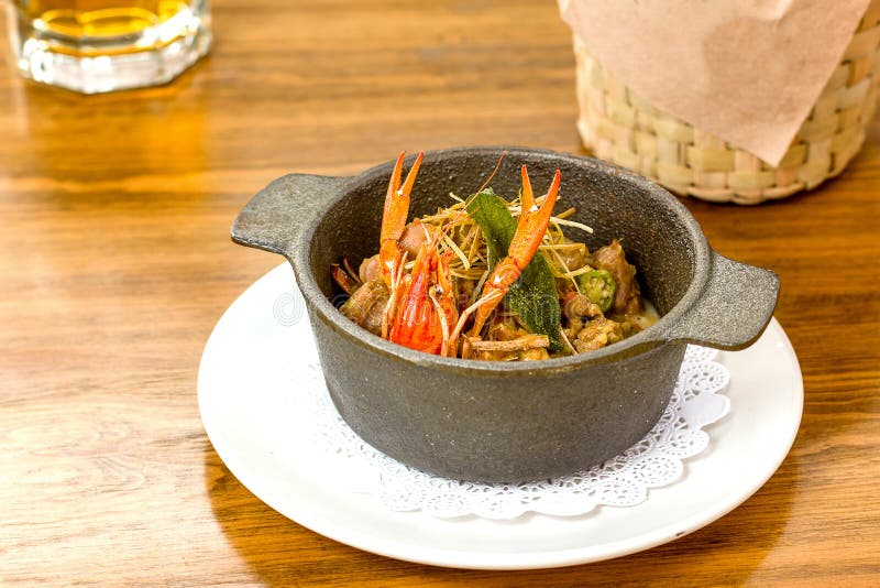 Fish soup in a grey dish stock image. Image of bouillabaisse - 97196811