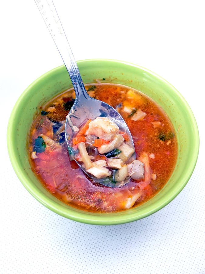Fish soup and spoon stock photo. Image of cooking, green - 6953518