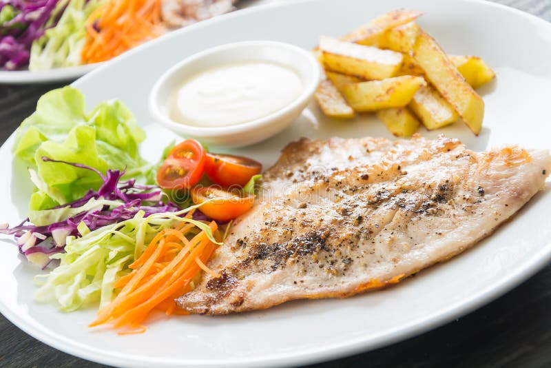 Fish steak stock image. Image of gourmet, lemon, restaurant - 82996075