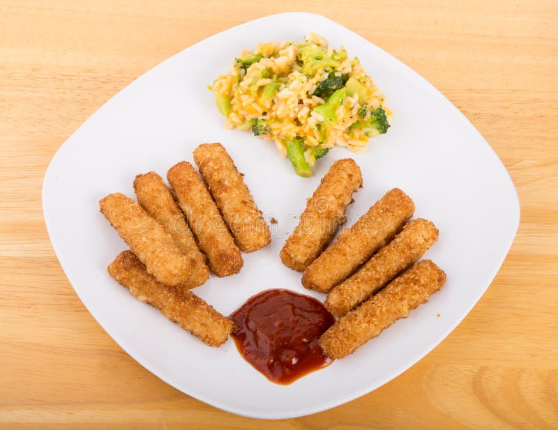 Fish Sticks with Broccoli Cheese Casserole Stock Photo - Image of ...